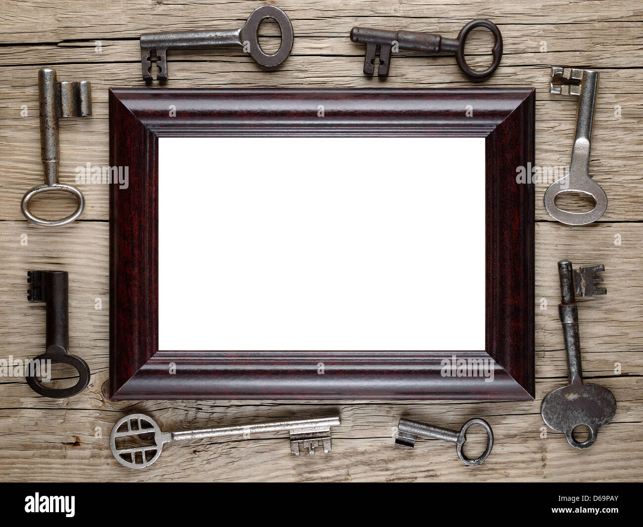 Photo frame and vintage keys on wooden background Stock Photo - Alamy