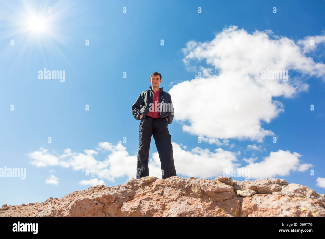 Man standing on cliff above hi-res stock photography and images - Alamy