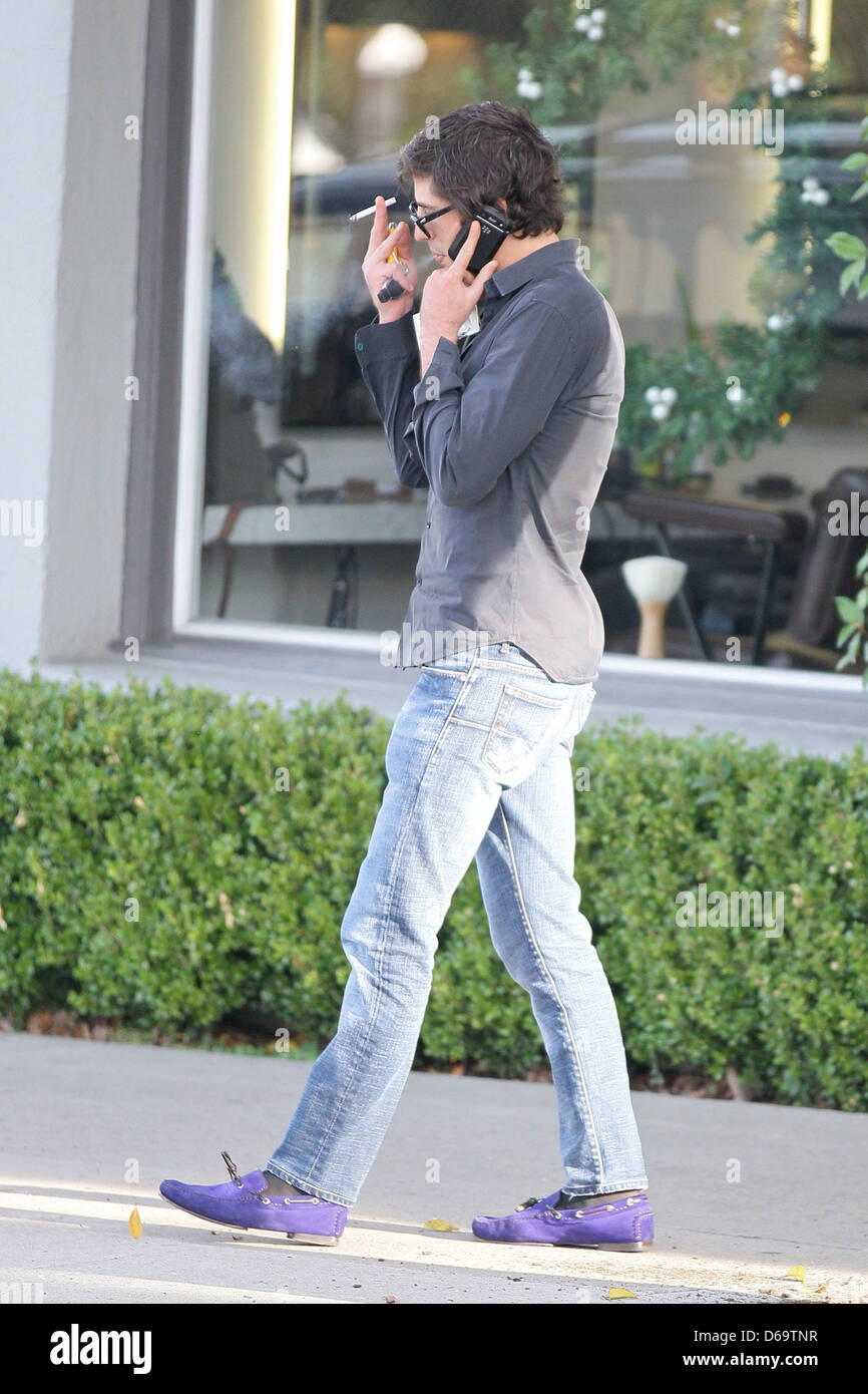 Brandon Davis smoking and talking on his cell phone in Beverly Hills ...
