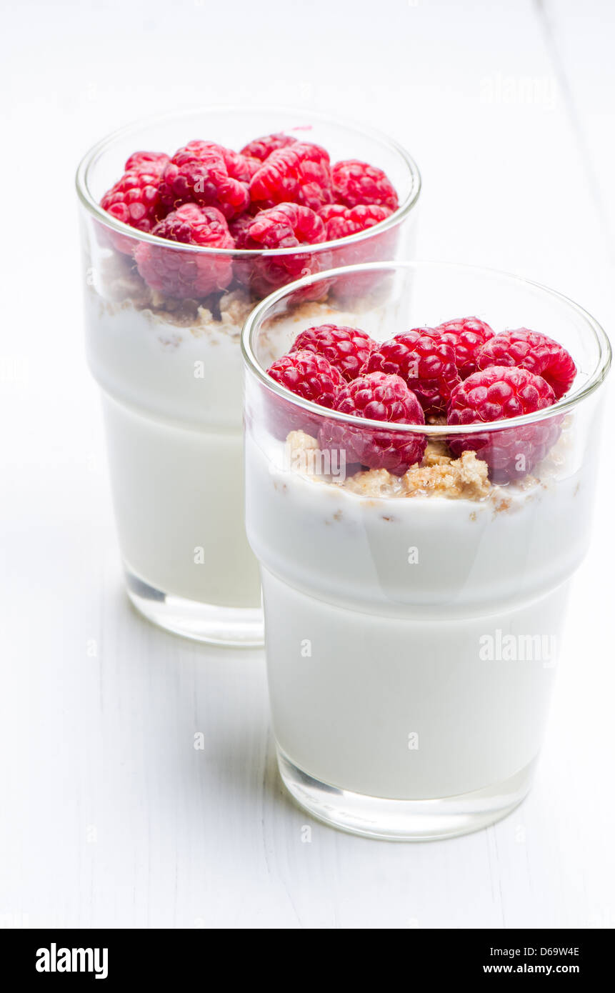 Yogurt with raspberries Stock Photo - Alamy