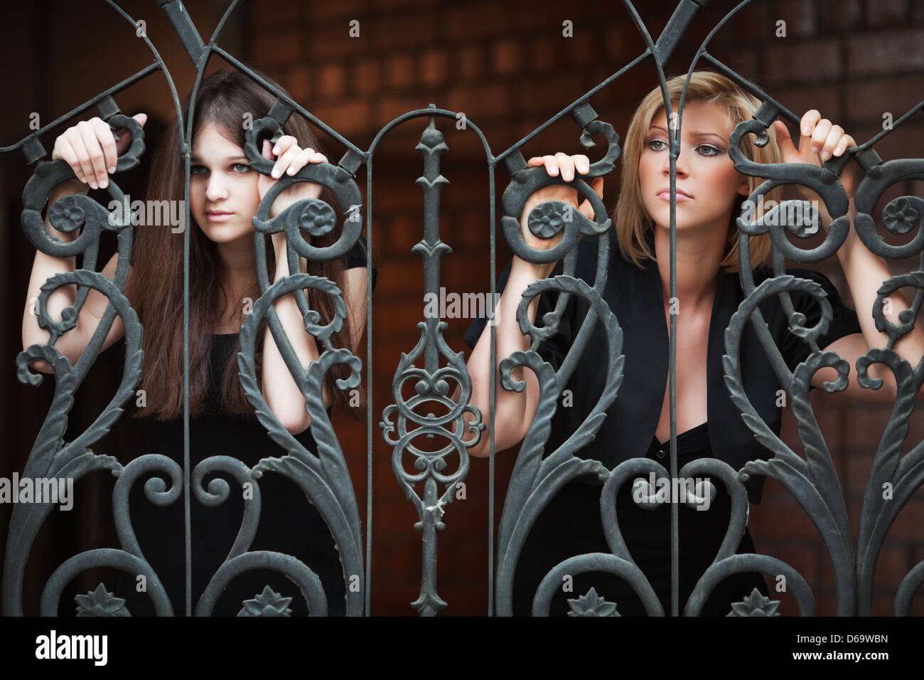 Two sad young women Stock Photo - Alamy