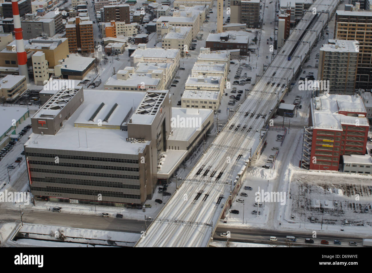 The JR Tower in Sapporo, Hokkaido, Japan, is captured amidst snowy ...