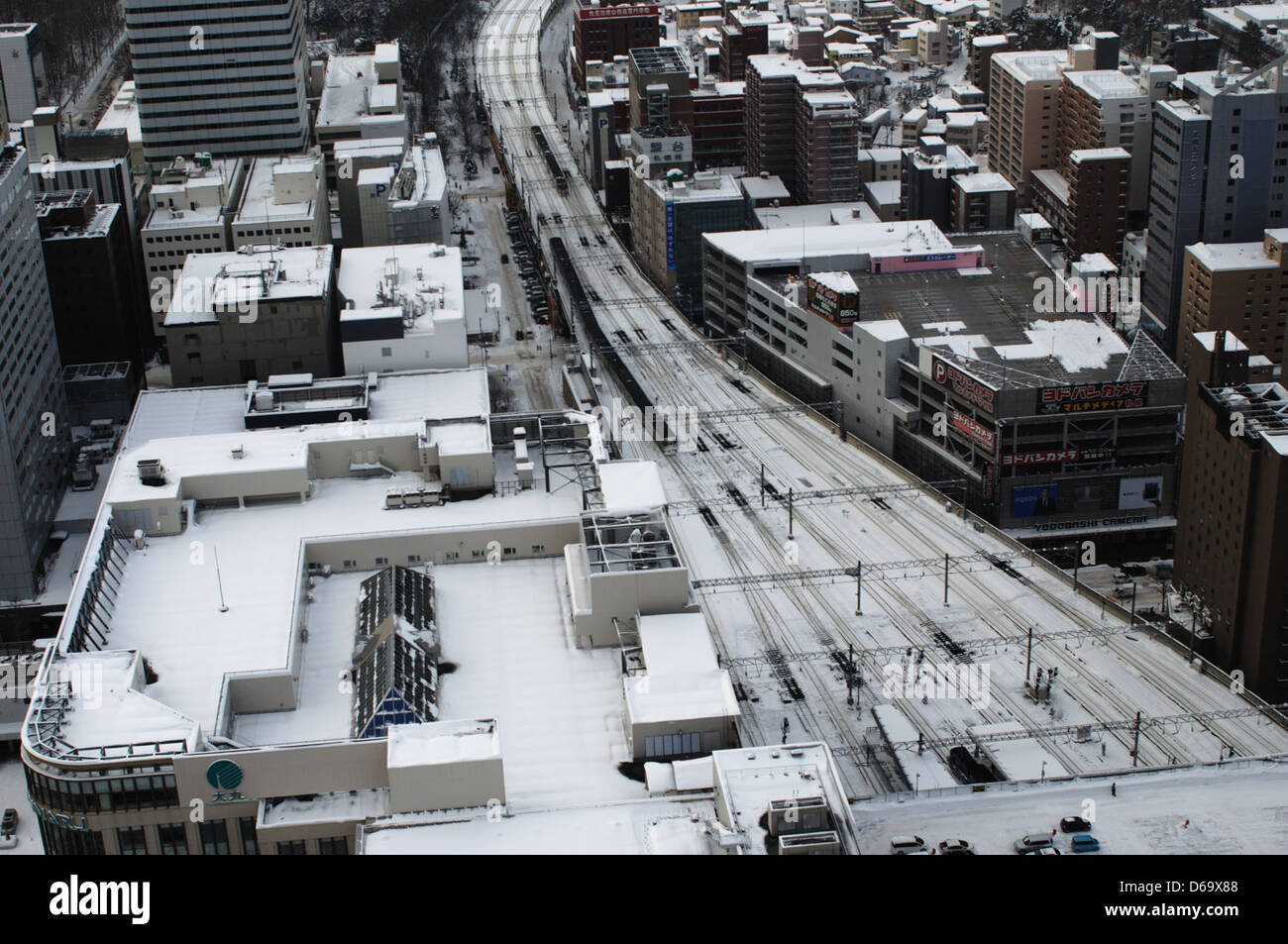 The image features the JR Tower in Sapporo, Hokkaido, Japan, during the ...