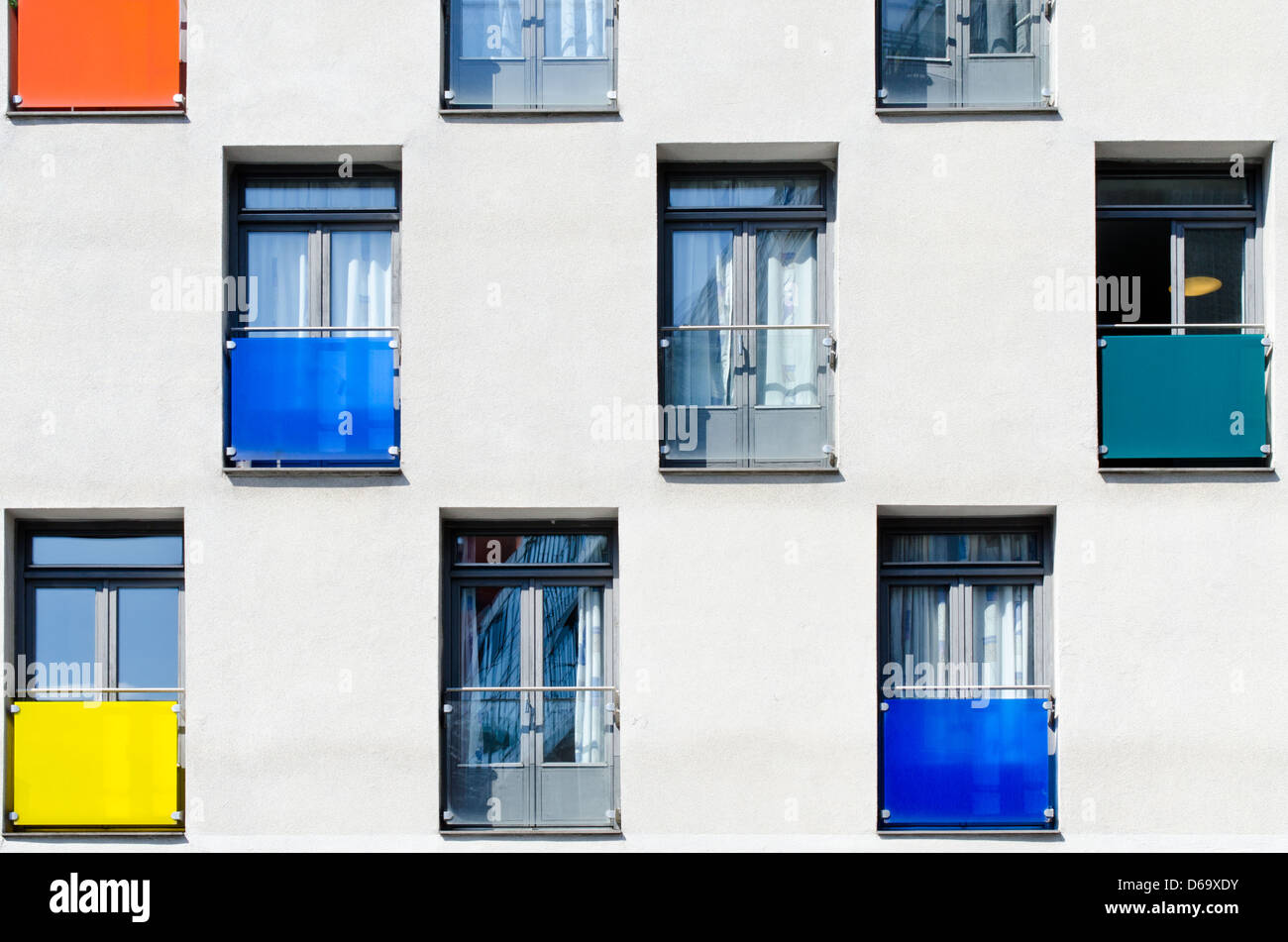 Wall with colorful windows Stock Photo - Alamy