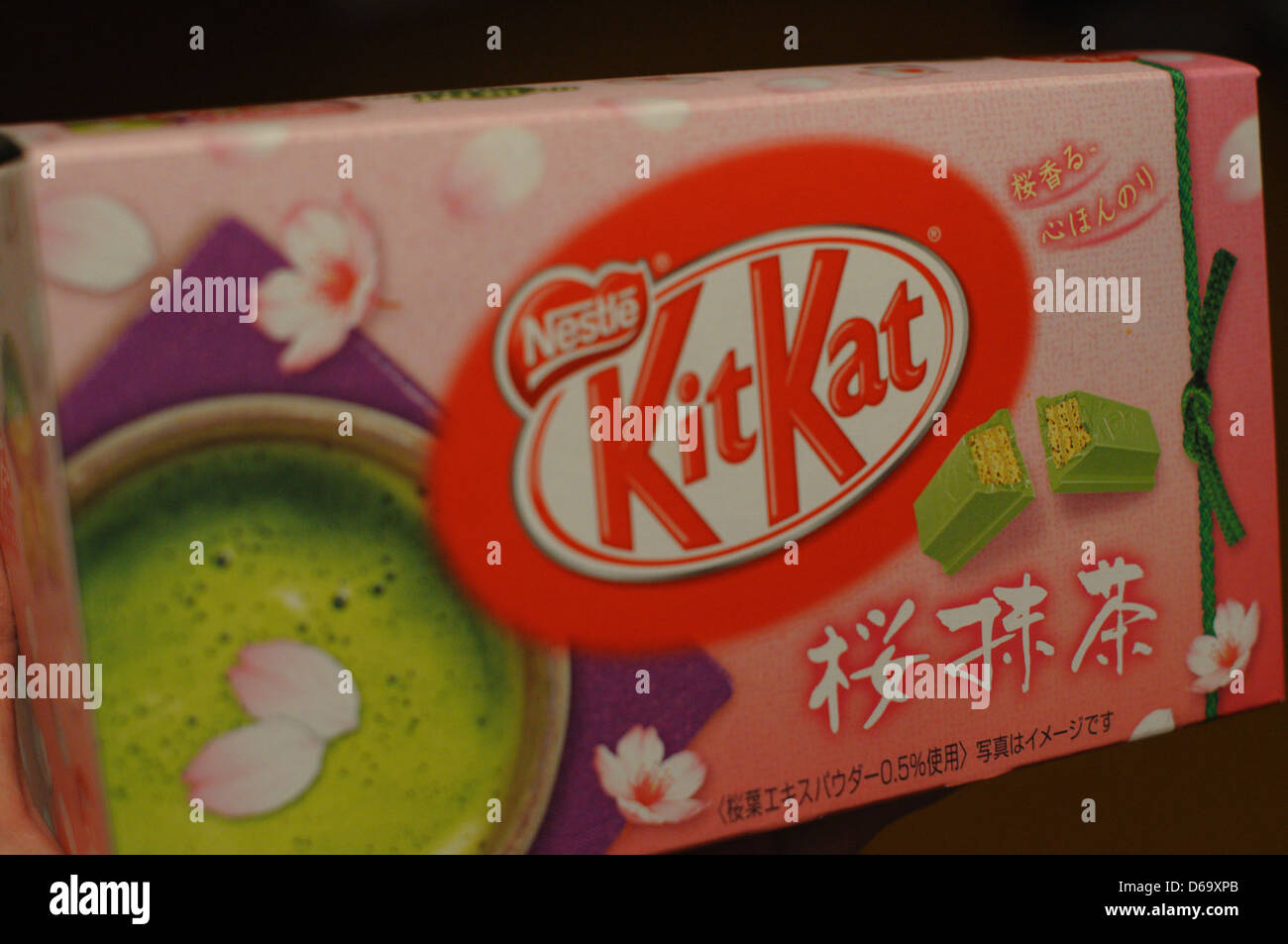 This image features a KitKat chocolate bar flavored with matcha, a ...
