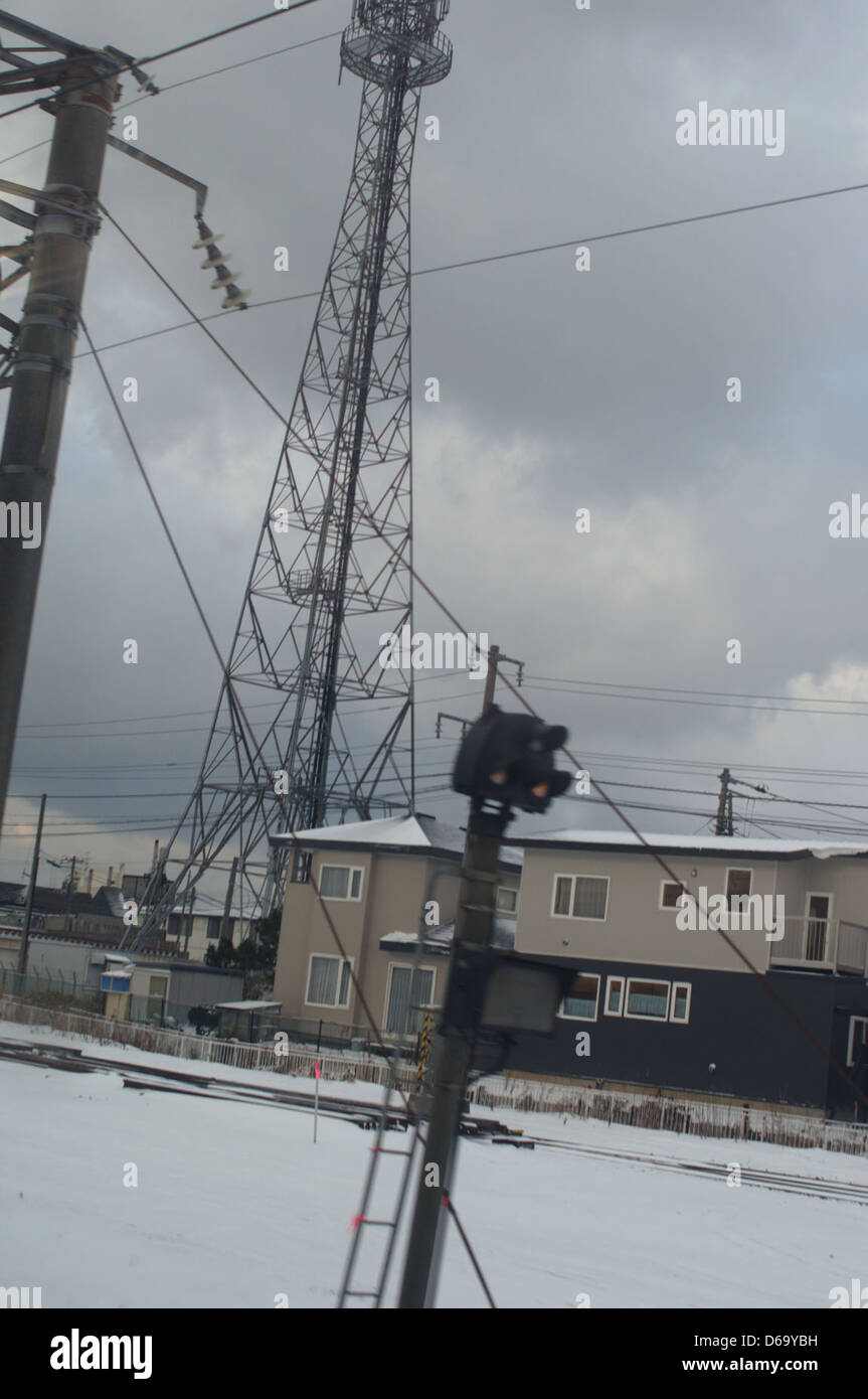 The image depicts the scenic Hakodate Line in Hokkaido, Japan. The ...