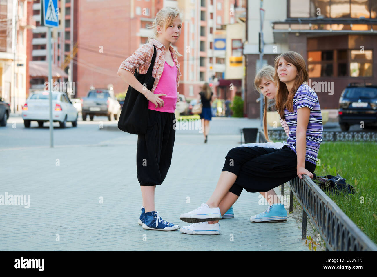 Teenage girls on a city street Stock Photo - Alamy