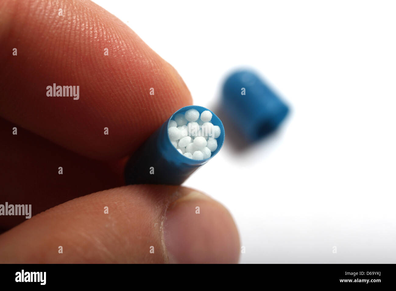 open homeopathic capsule Stock Photo - Alamy