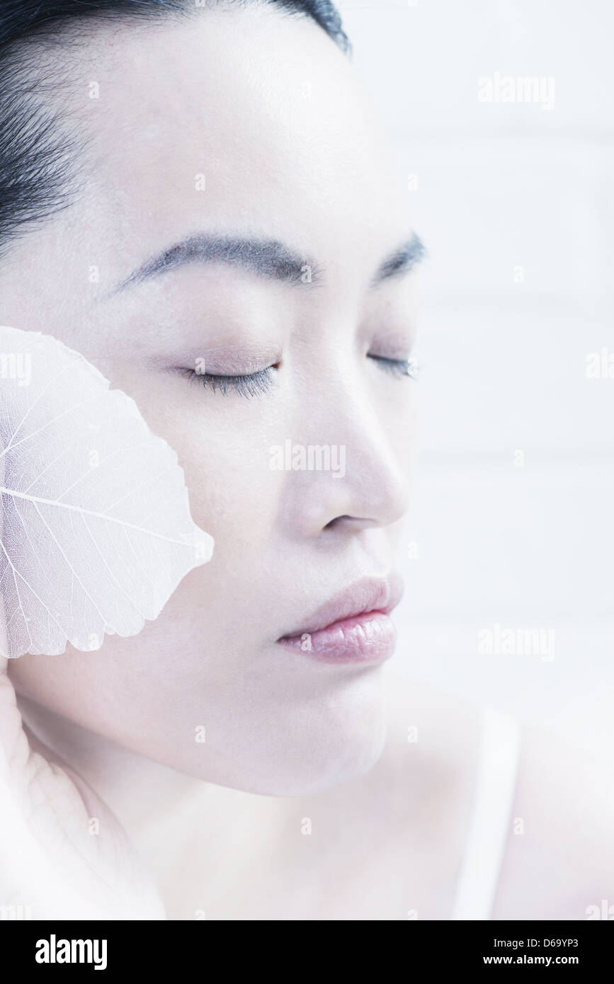 Beauty face and leaves hi-res stock photography and images - Alamy