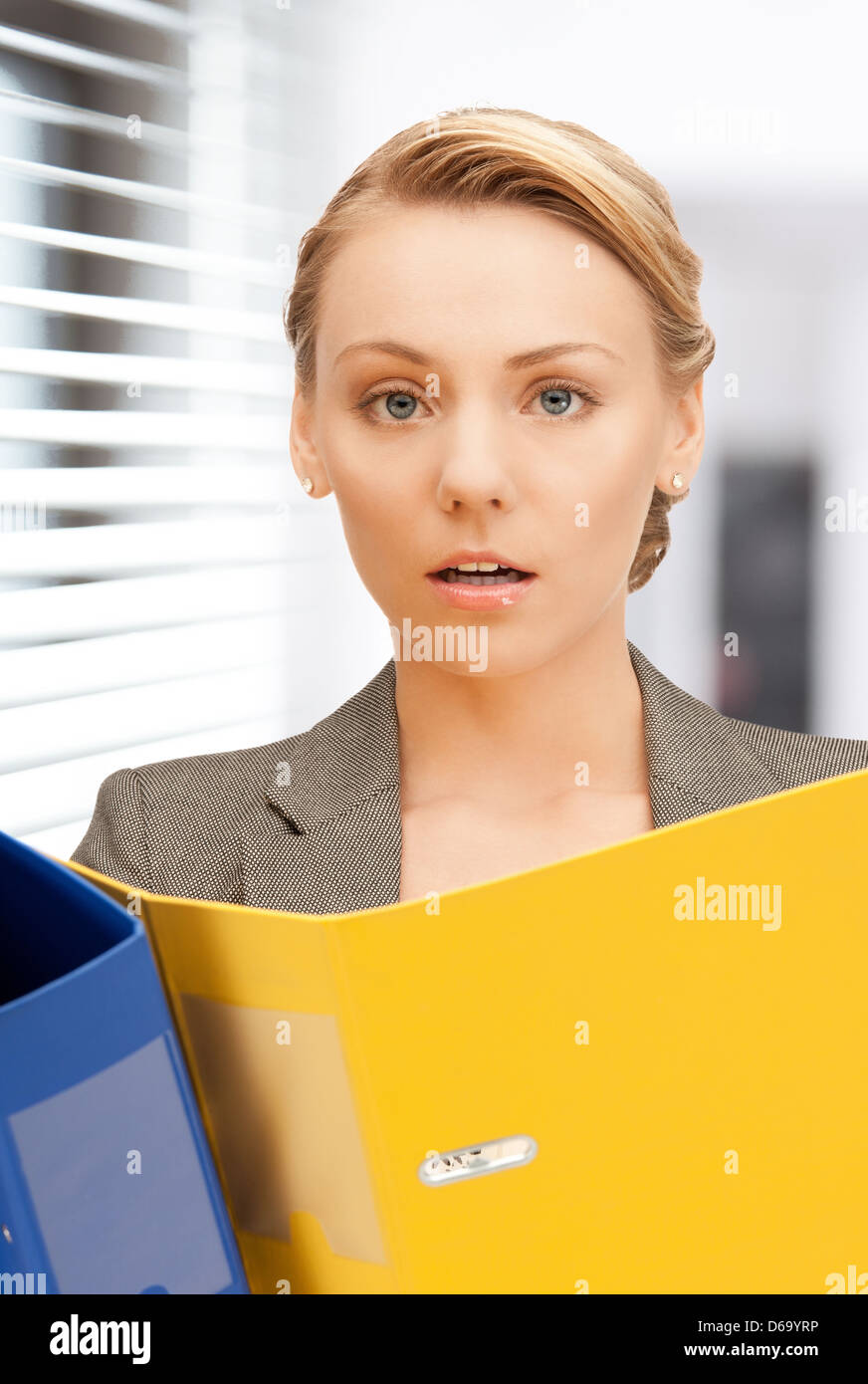 woman with folders Stock Photo - Alamy