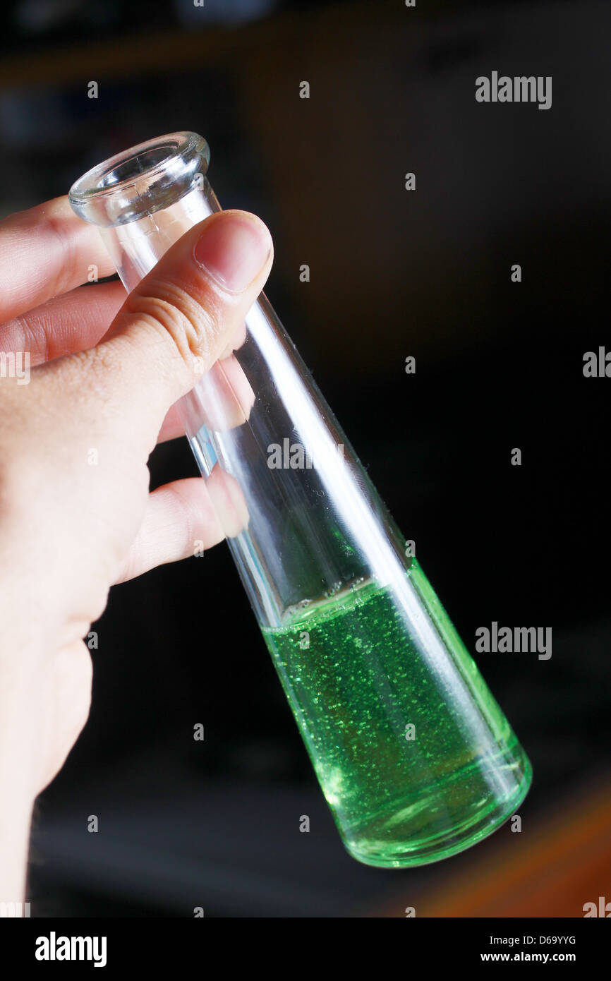 green liquid in a test tube Stock Photo - Alamy