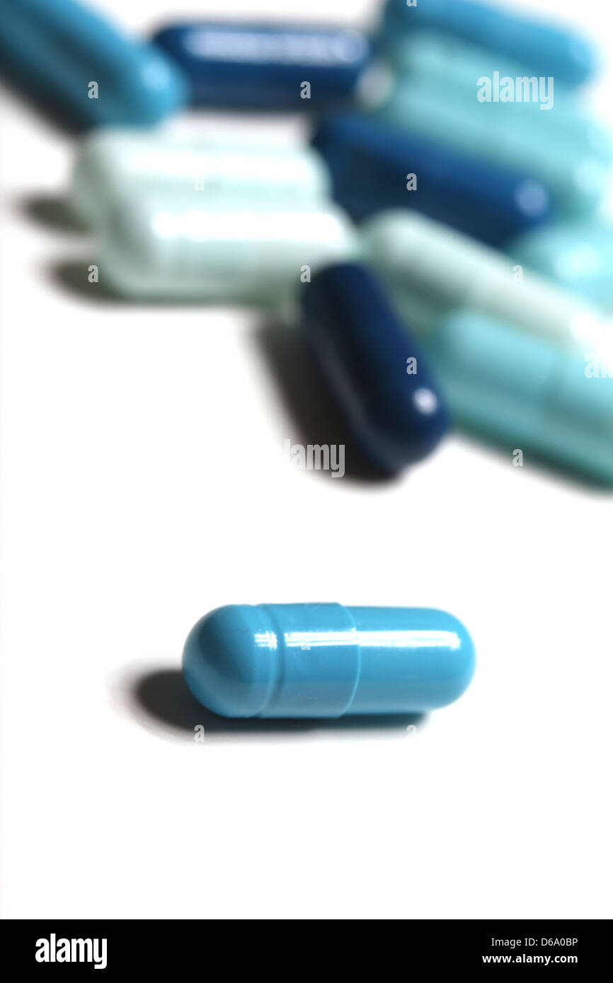 colored isolated medicinical capsules Stock Photo - Alamy