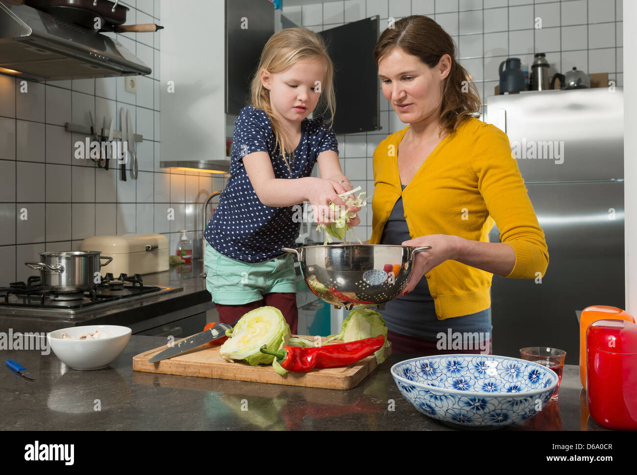 Mother watching daughter caucasian hi-res stock photography and images ...