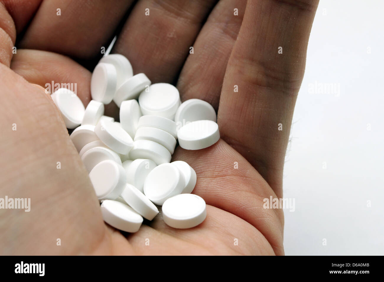 tablets in a hand Stock Photo - Alamy
