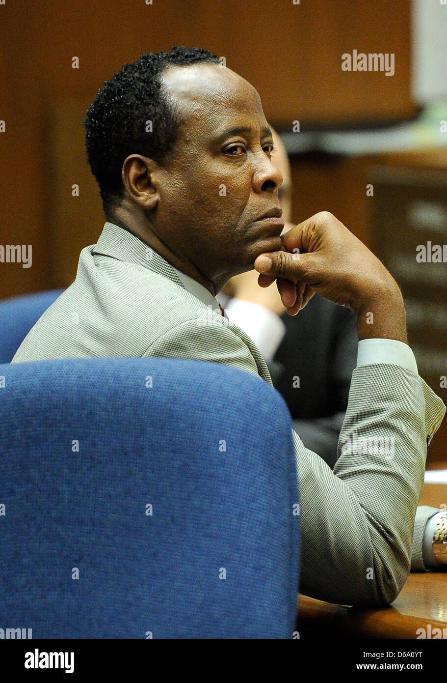 Dr. Conrad Murray listens as defense attorney Ed Chernoff ( pictured ...