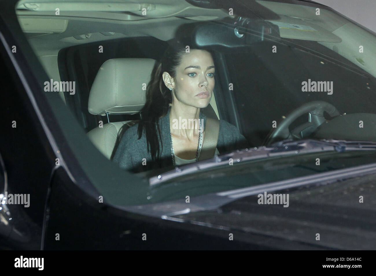 Denise Richards driving out of parking garage in Beverly Hills, on the ...
