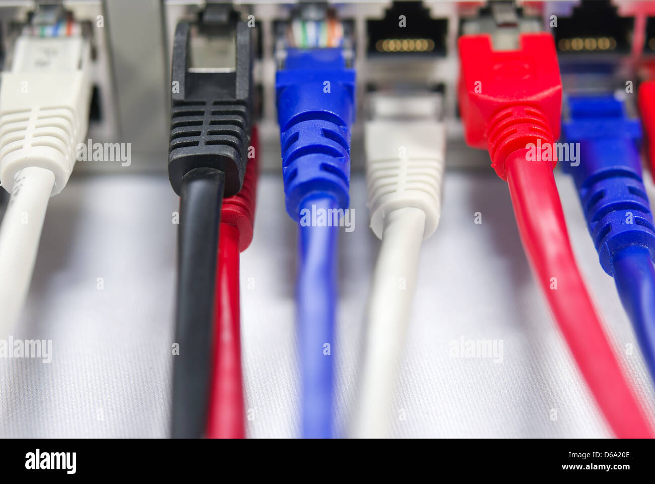 Network switch and colorful cables Stock Photo - Alamy