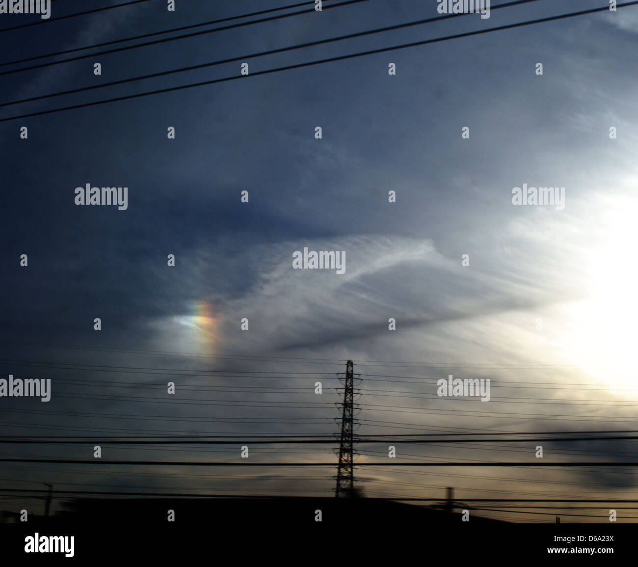 This image captures a Shinkansen, Japan’s iconic bullet train, under a ...