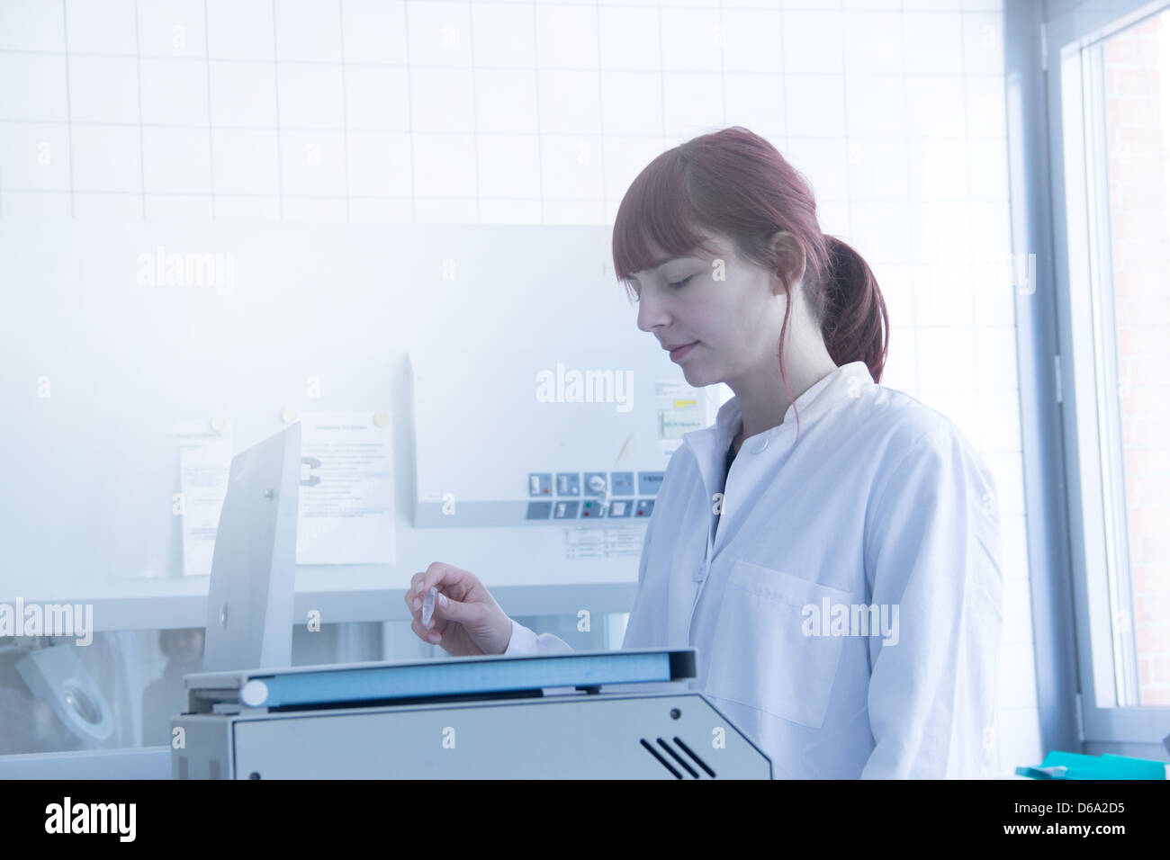 Using lab equipment hi-res stock photography and images - Alamy