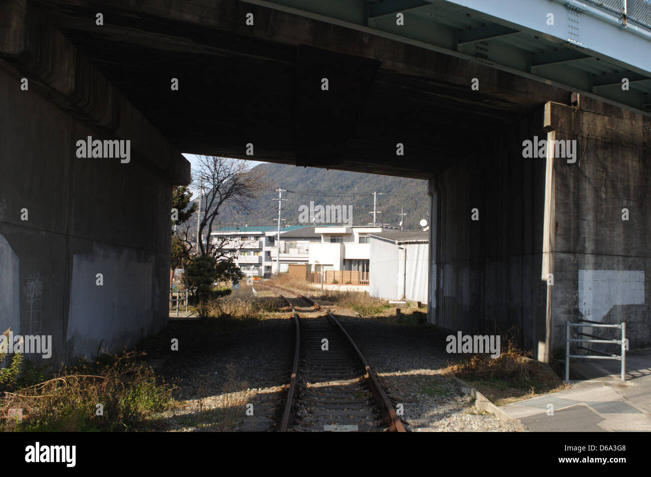 This photo captures a train traveling along the Kabe Line in North ...