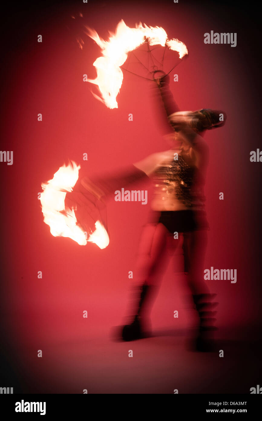 Fire dancer performing Stock Photo - Alamy