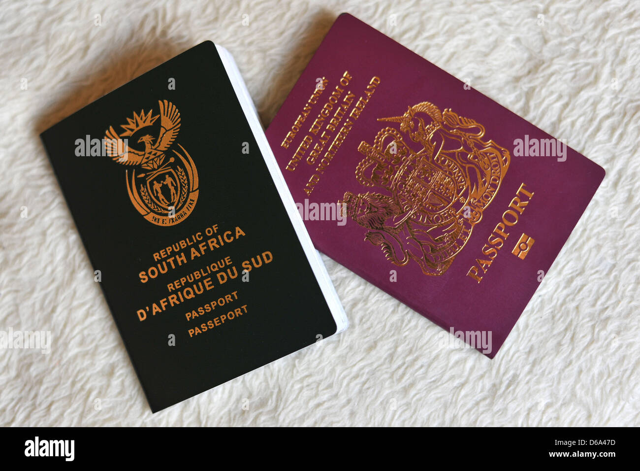 An Example Of A New British And A New South African Passport Stock an-example-of-a-new-british-and-a-new-south-african-passport-stock