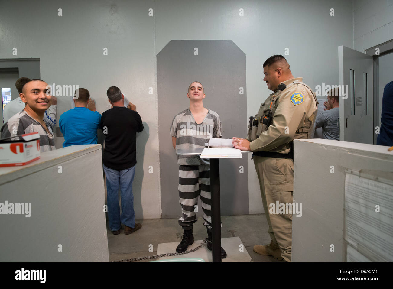 Inmates get photographed by the prison Stock Photo - Alamy