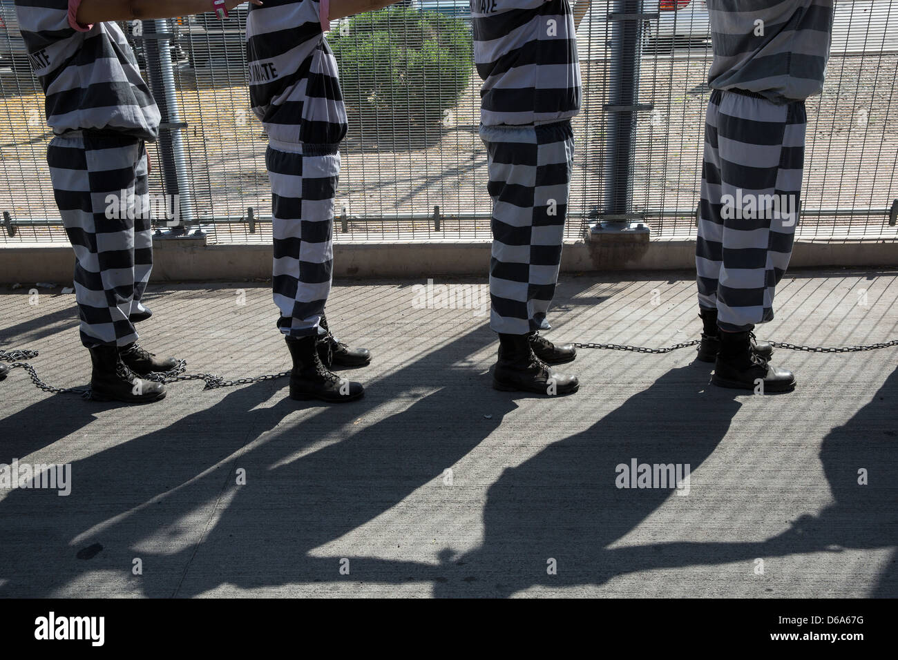 Female inmates stand in line Stock Photo - Alamy