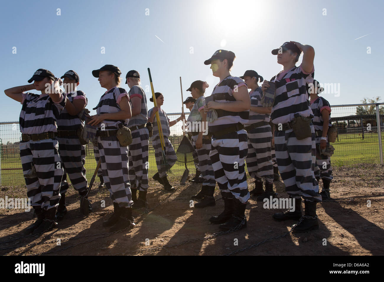 Female inmates about to start weeding duty Stock Photo - Alamy