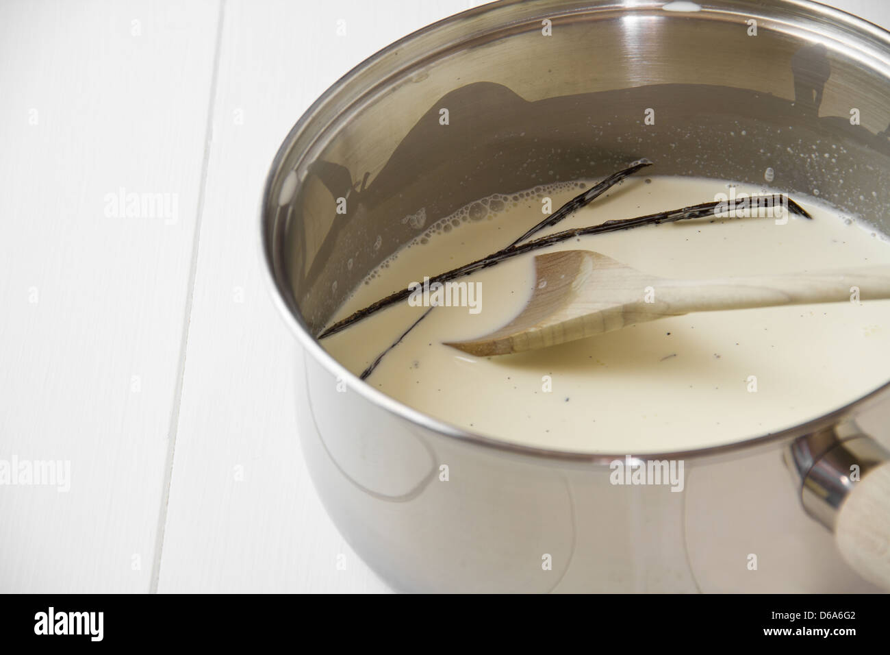Vanilla infused cream and milk Stock Photo - Alamy