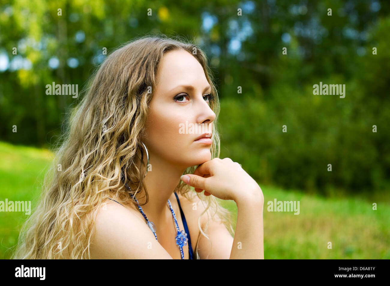 Thoughtful young woman Stock Photo - Alamy Thoughtful young woman Stock Photo - Alamy