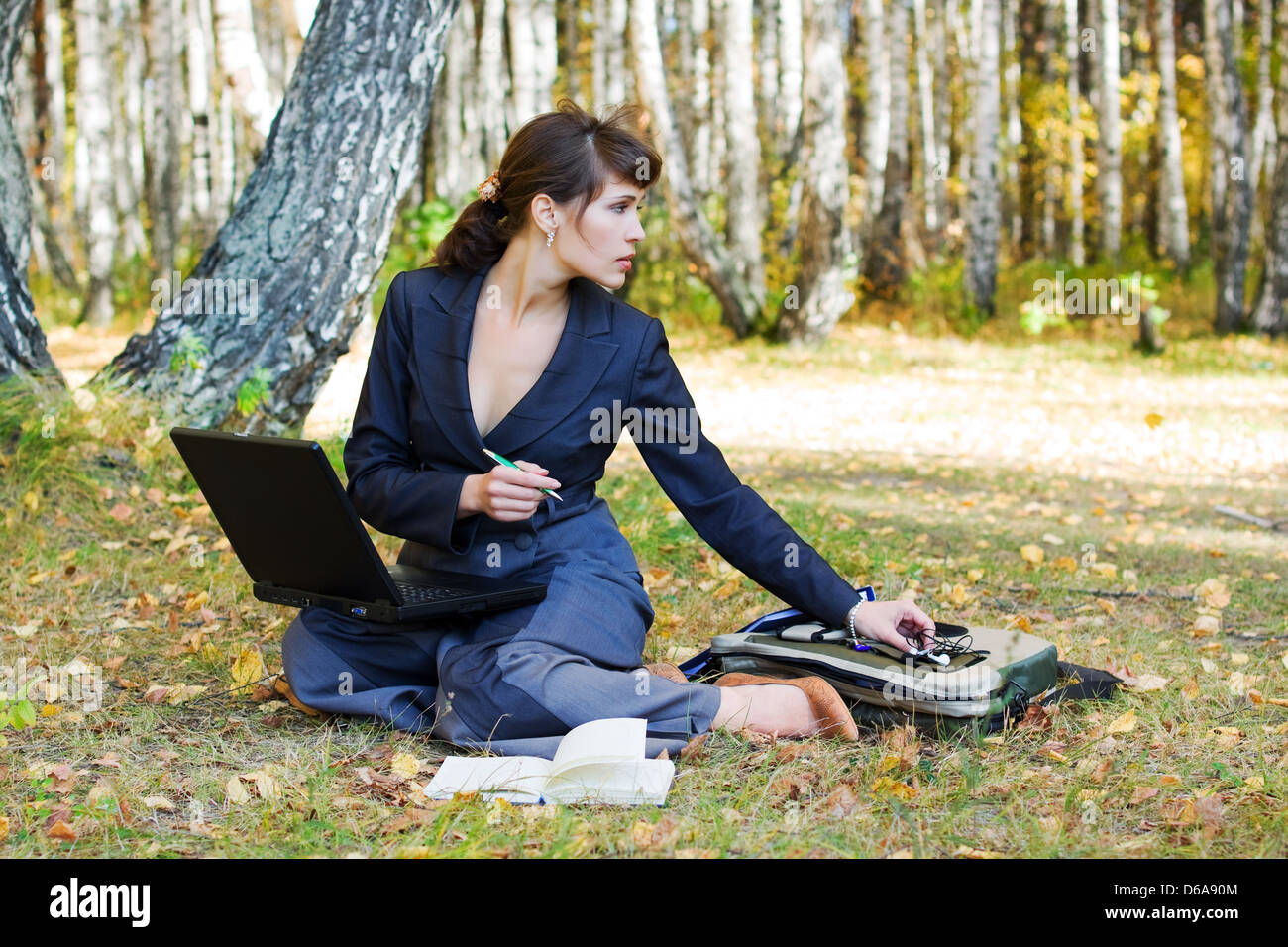Businesswoman working on nature Stock Photo - Alamy