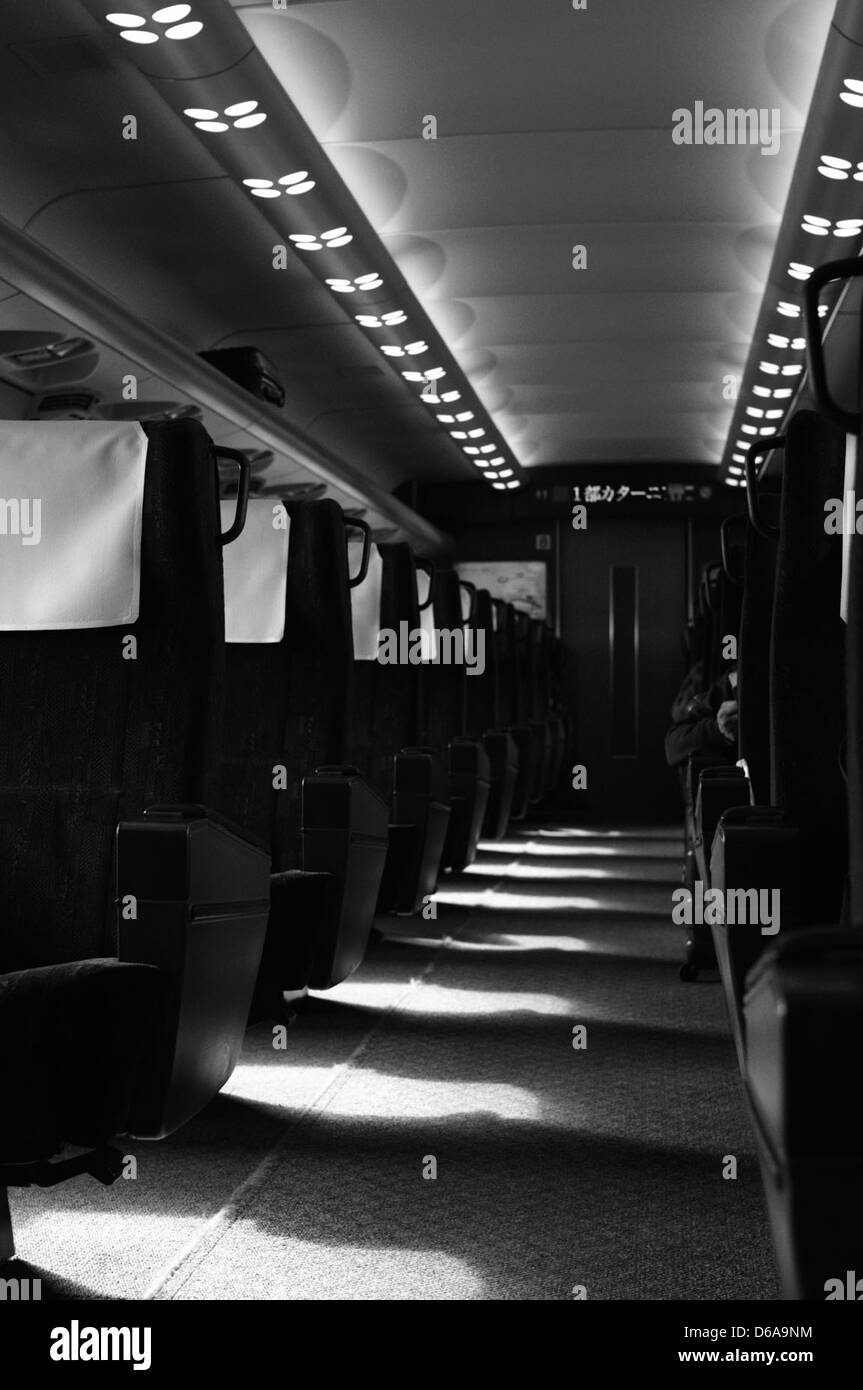 The image depicts the Shinkansen 700 series, a high-speed train on the ...