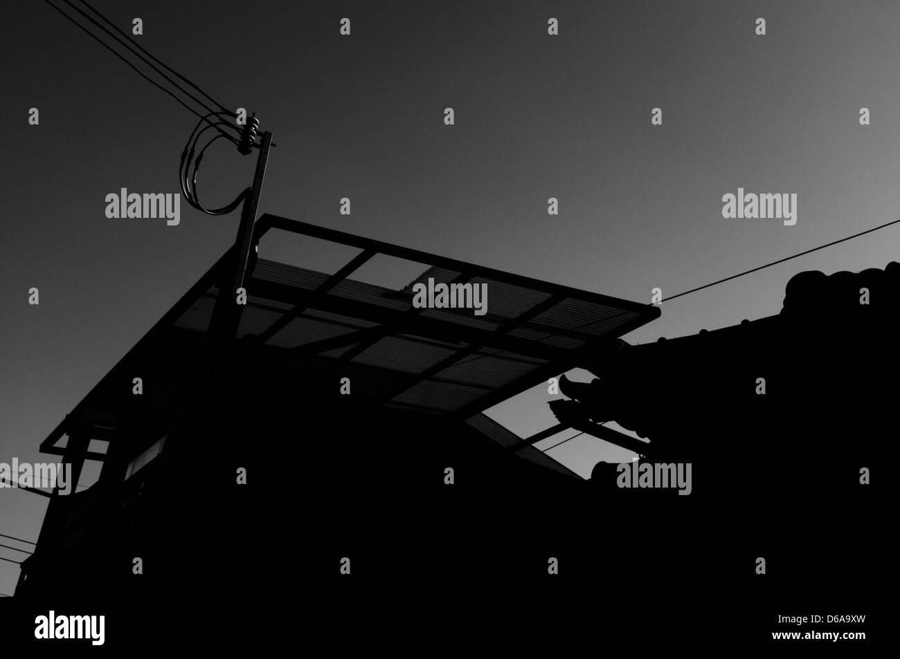 The image portrays a busy urban street scene filled with pedestrians ...