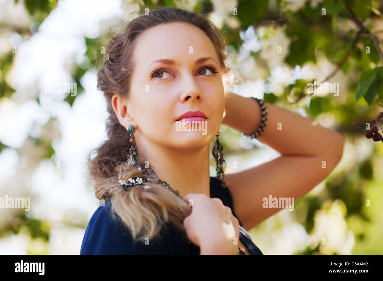 Beautiful woman on nature Stock Photo - Alamy