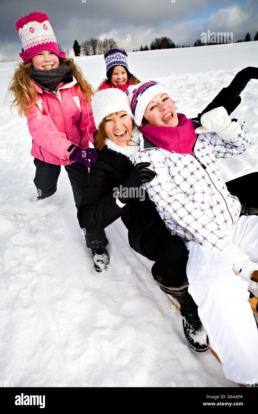 Sledging people hi-res stock photography and images - Alamy