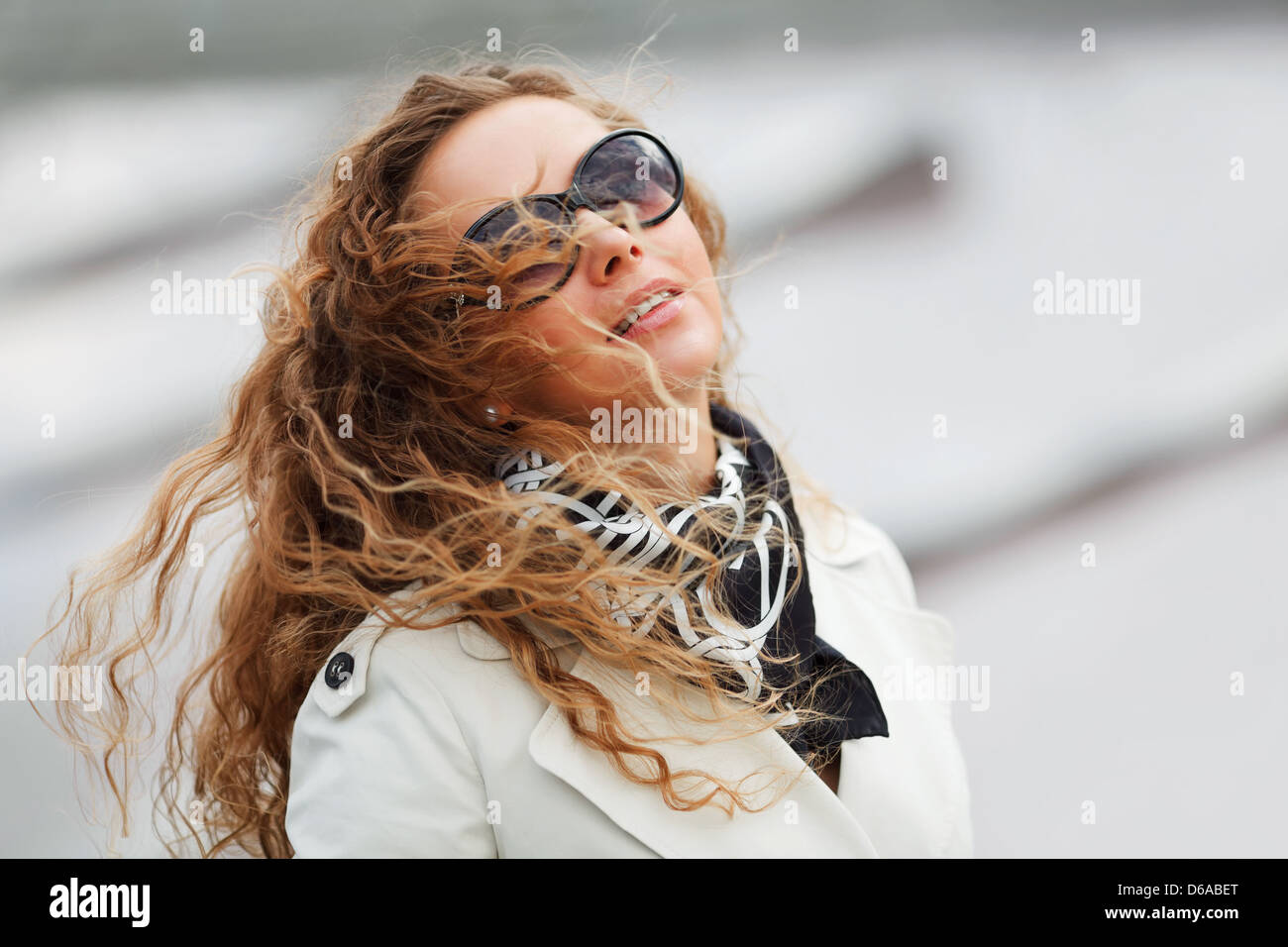 Woman in the wind Stock Photo - Alamy