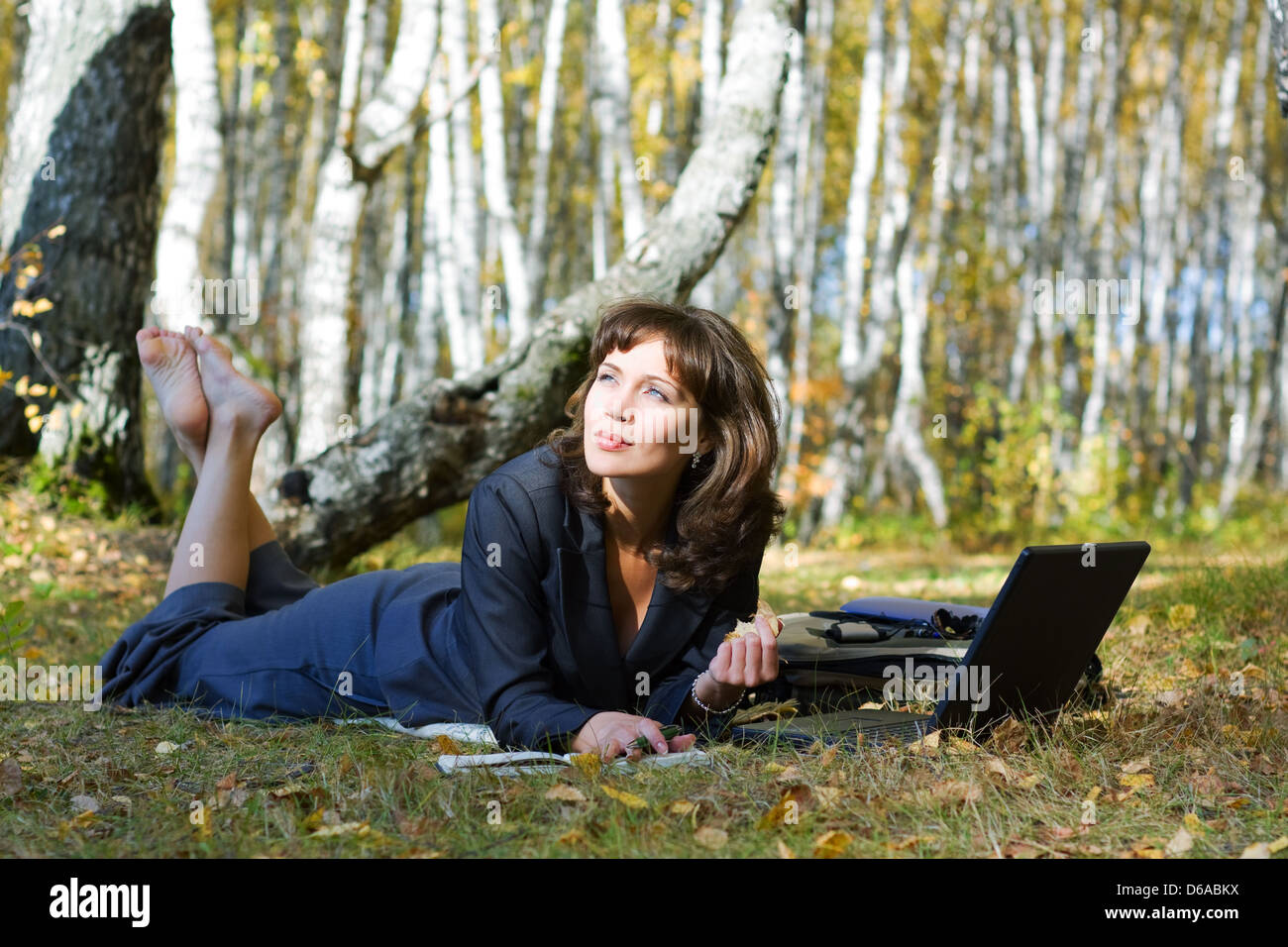Businesswoman working on nature Stock Photo - Alamy