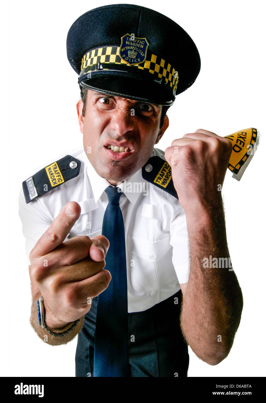 Studio cut out of an aggressive traffic warden Stock Photo - Alamy