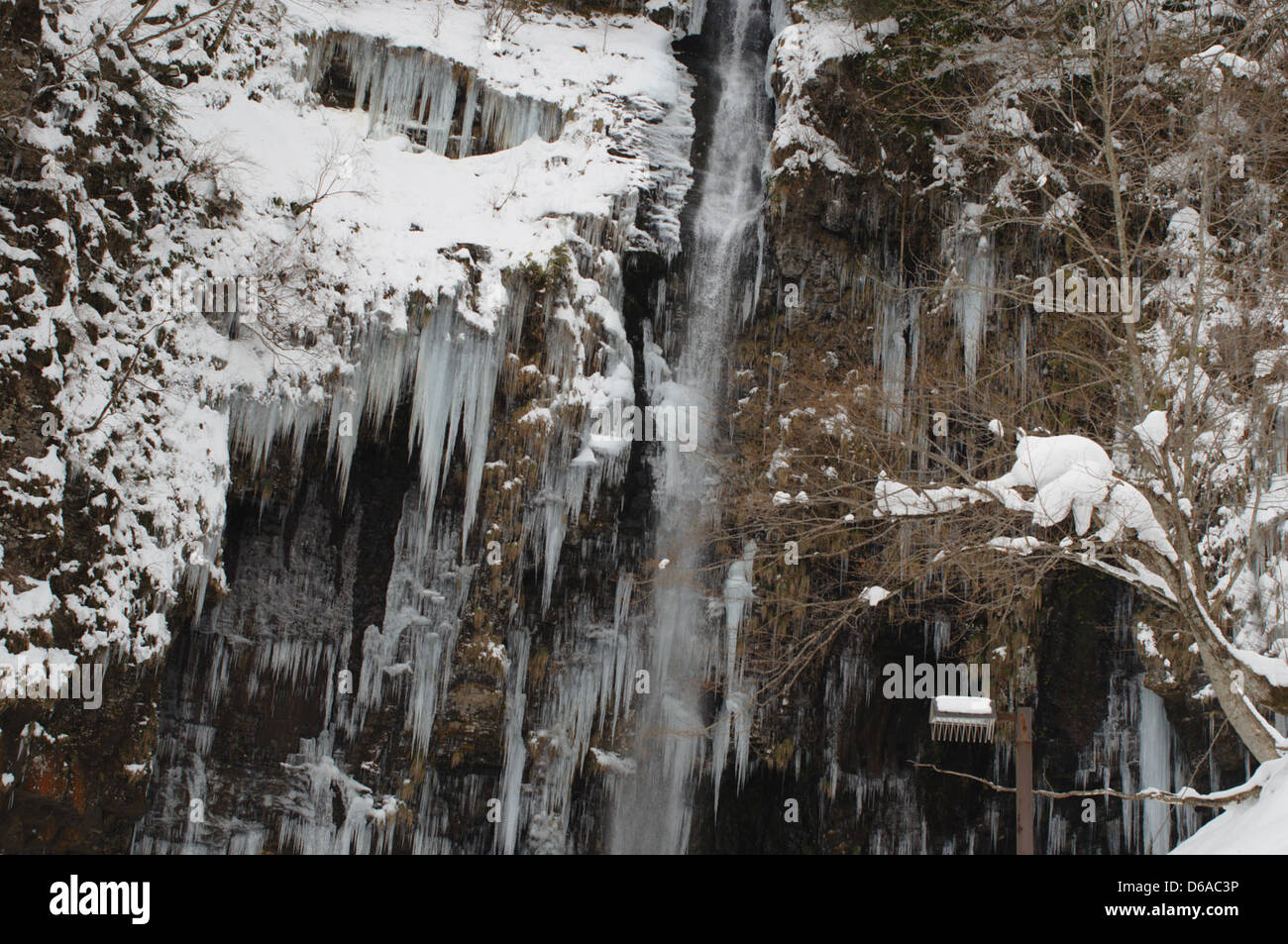 Amida Waterfall in Gifu Prefecture, Japan, is captured in winter, with ...