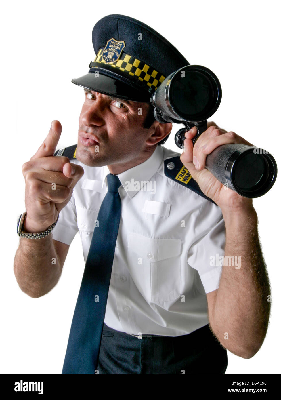 Studio cut out of an aggressive traffic warden Stock Photo - Alamy