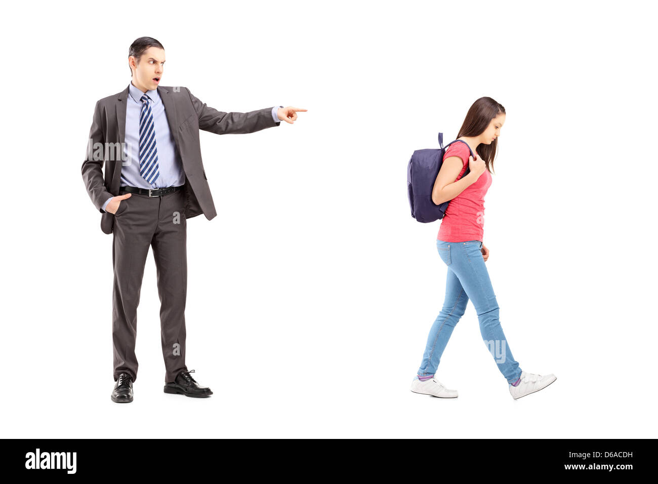 Full length portrait of an angry father shouting at his daughter ...