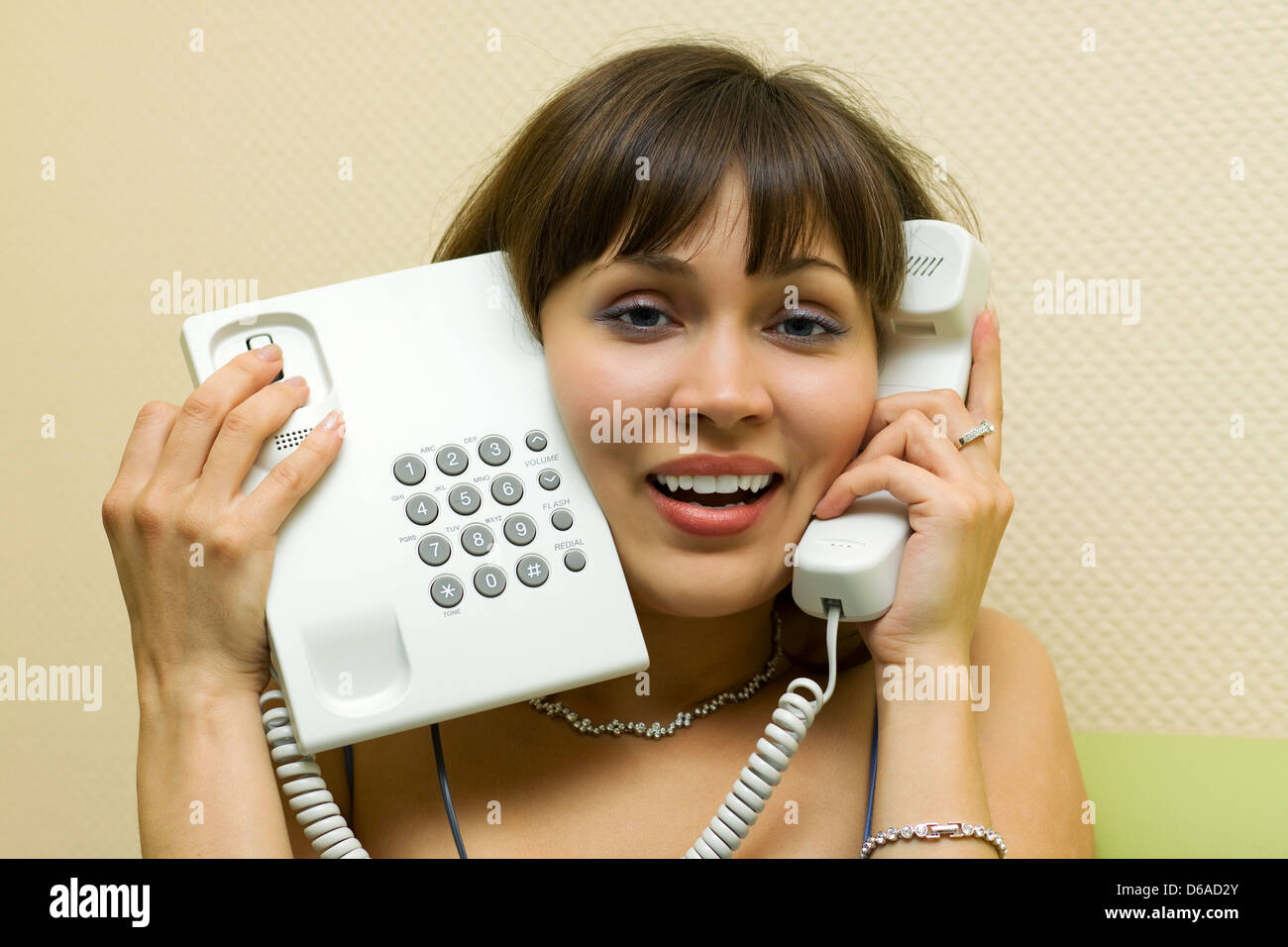 Happy woman on the phone Stock Photo - Alamy