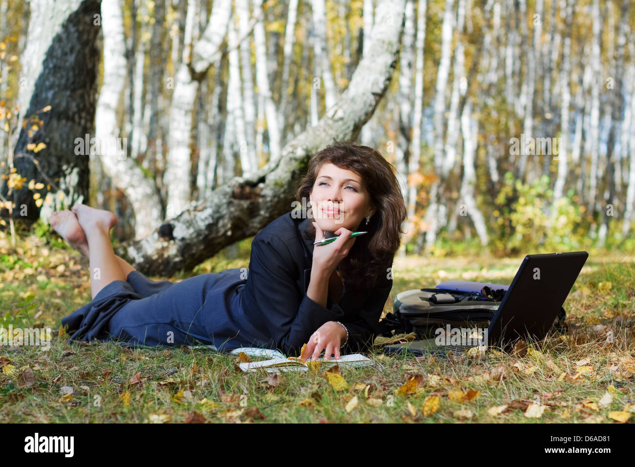 Businesswoman working on nature Stock Photo - Alamy