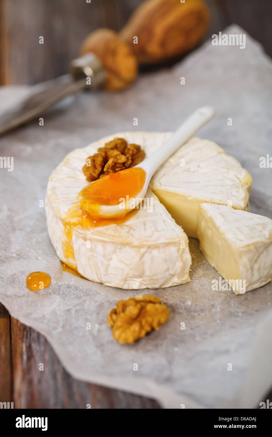 Cheese with nuts and jam Stock Photo - Alamy