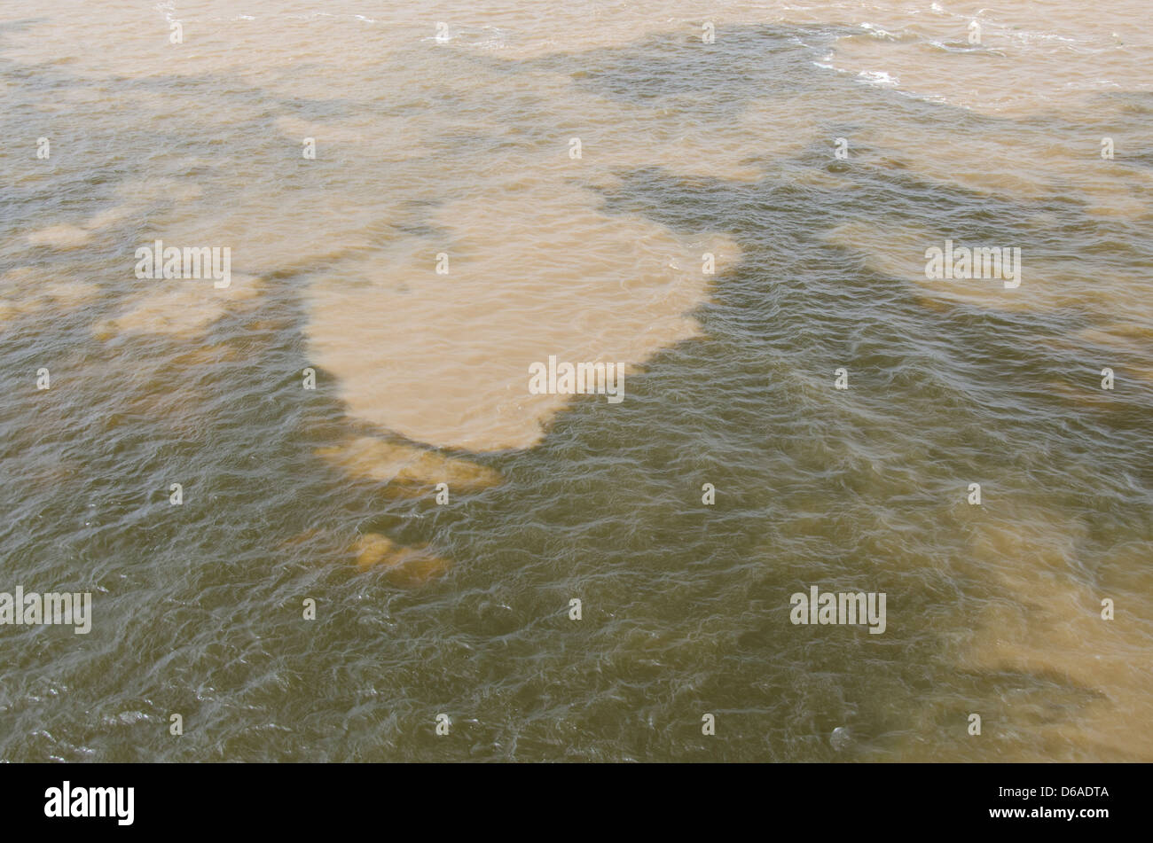Brazil, Amazon, Manaus. The Meeting of the Waters where the Solimoes ...