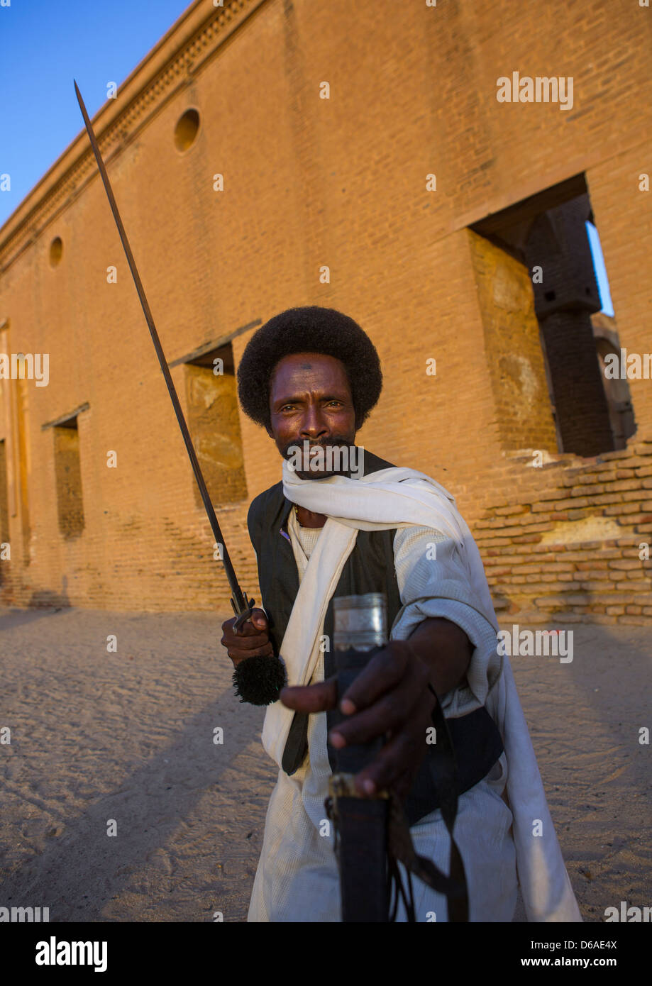 Beja Tribe Man Dancing In Front Of The Khatmiyah Mosque At The Base Of ...