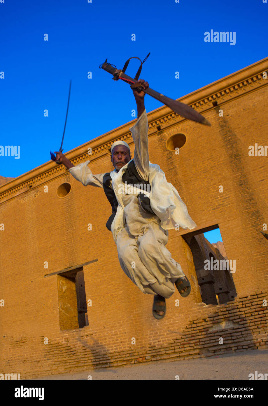 Beja Tribe Man Dancing In Front Of The Khatmiyah Mosque At The Base Of ...