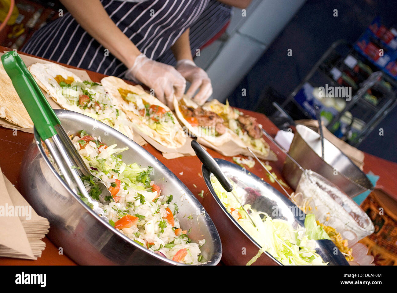 Preparing chicken wrap hi-res stock photography and images - Alamy