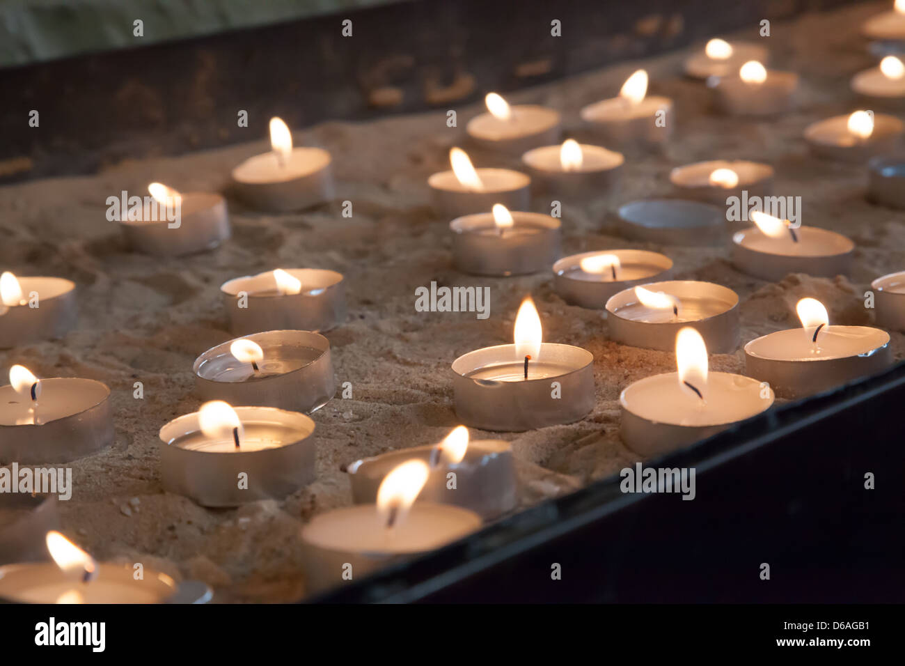 Candles burning in memory Stock Photo - Alamy